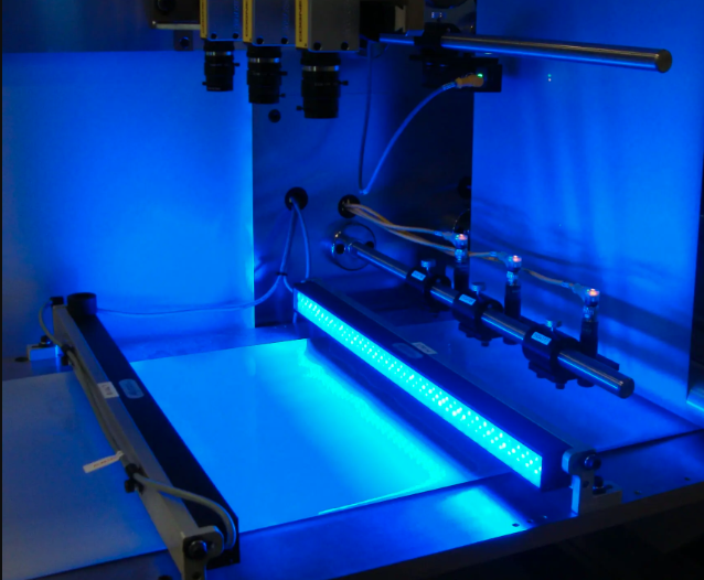 Detect micron-level defects on fast moving sheets